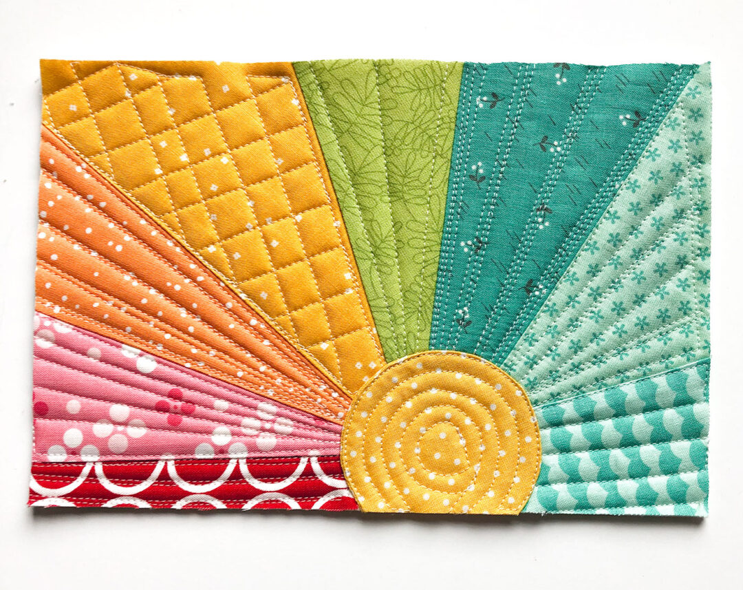 Quick and Easy Rainbow Sunset Mug Rug Tutorial - Ameroonie Designs