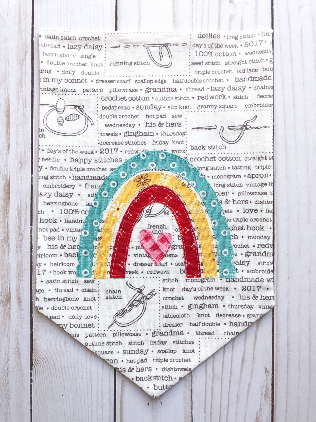 Use this free pattern to sew your own colorful Rainbow Banner