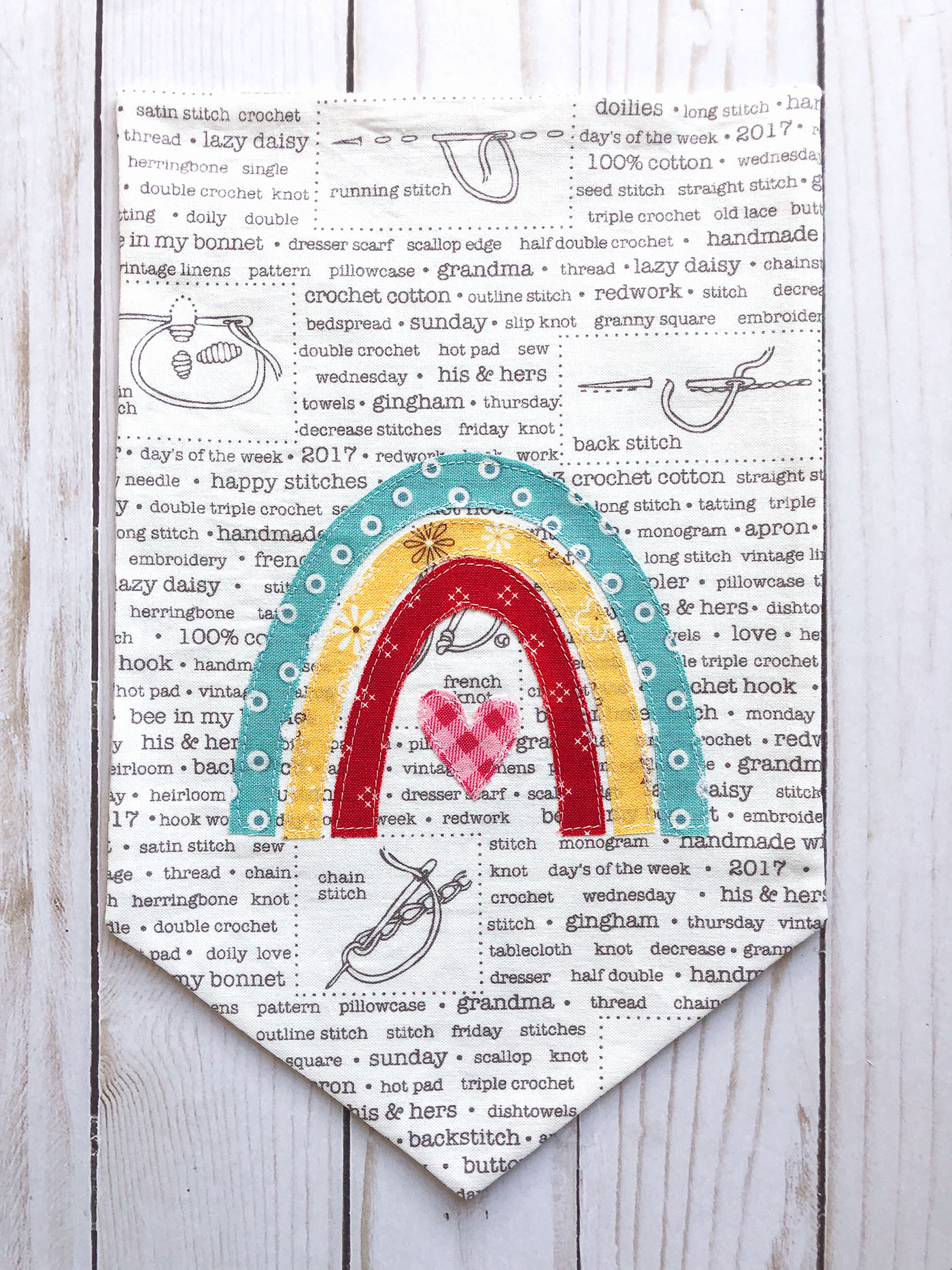 Use this free pattern to sew your own colorful Rainbow Banner