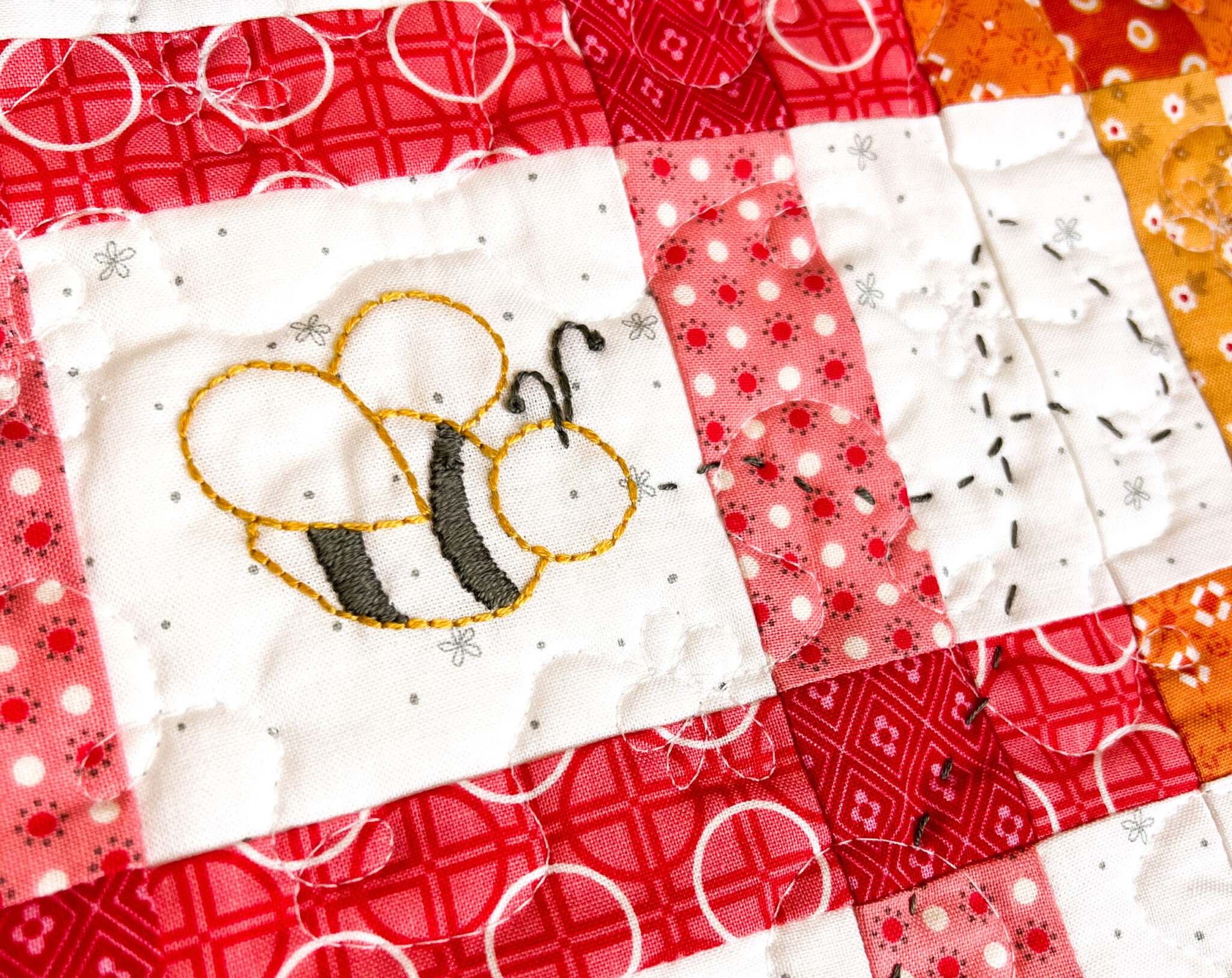 Merge Embroidery and Patchwork to make a stunning mini quilt