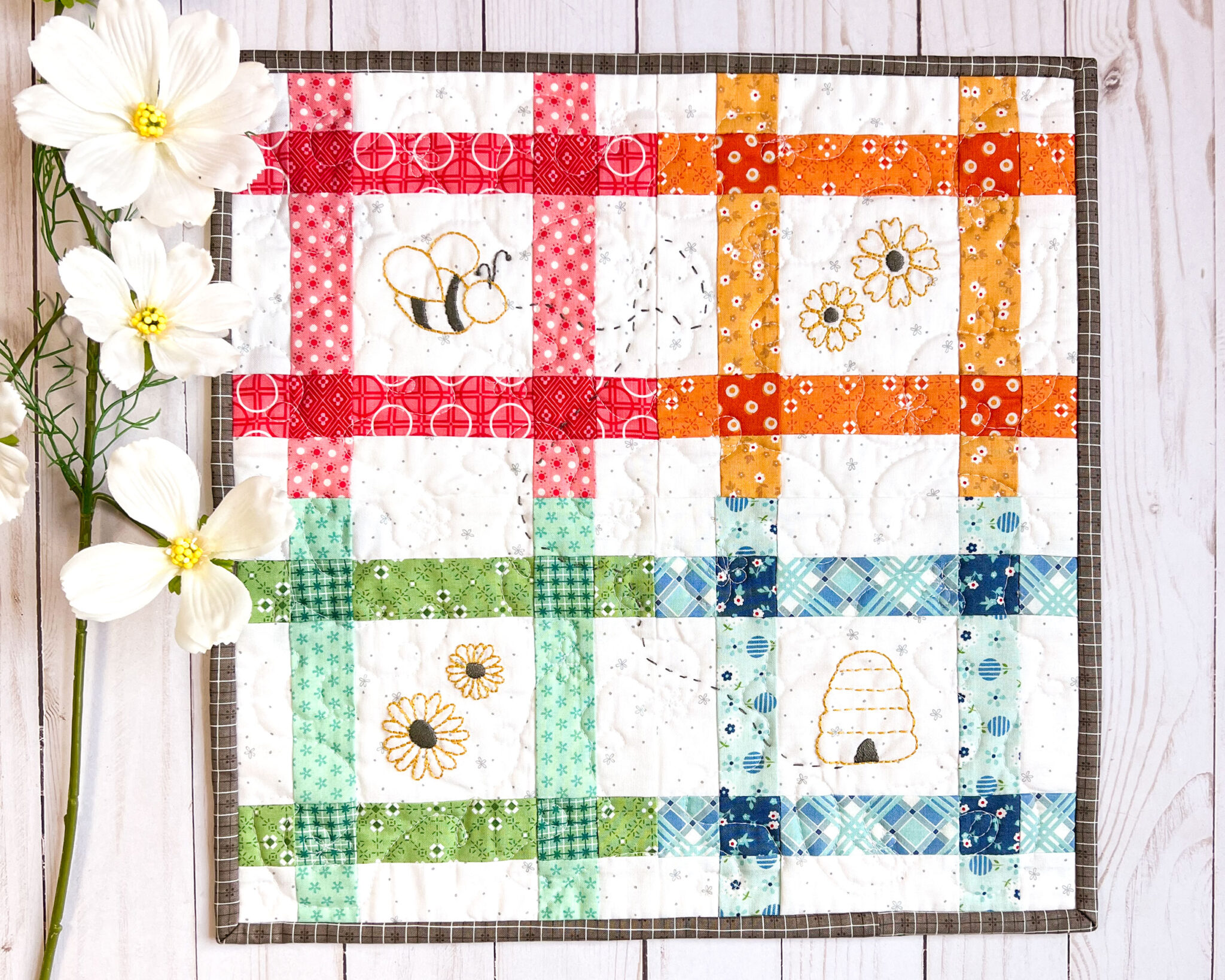 Merge Embroidery and Patchwork to make a stunning mini quilt
